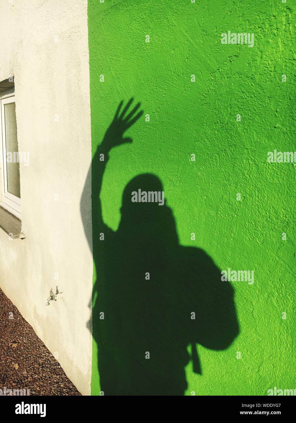 Man with hand raised hi-res stock photography and images - Alamy