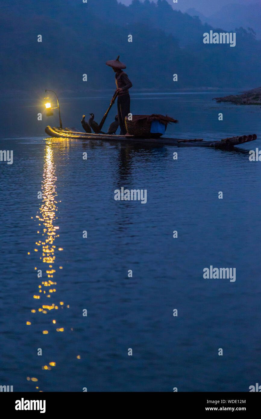 Man on raft with paddle hi-res stock photography and images - Alamy