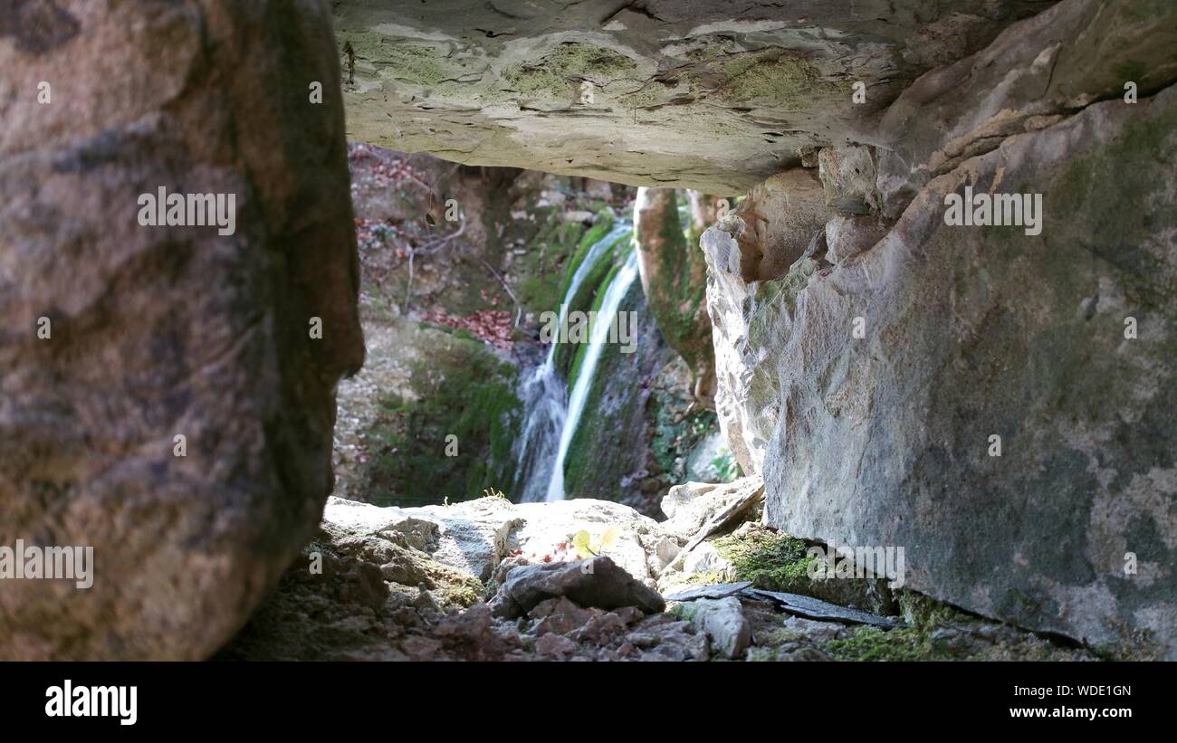 Behind the rocks hi-res stock photography and images - Alamy