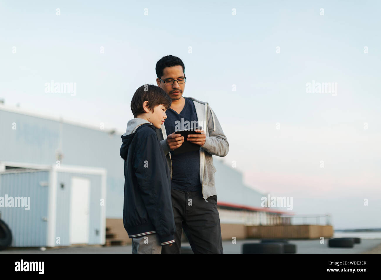 Parents using smart hi-res stock photography and images - Alamy