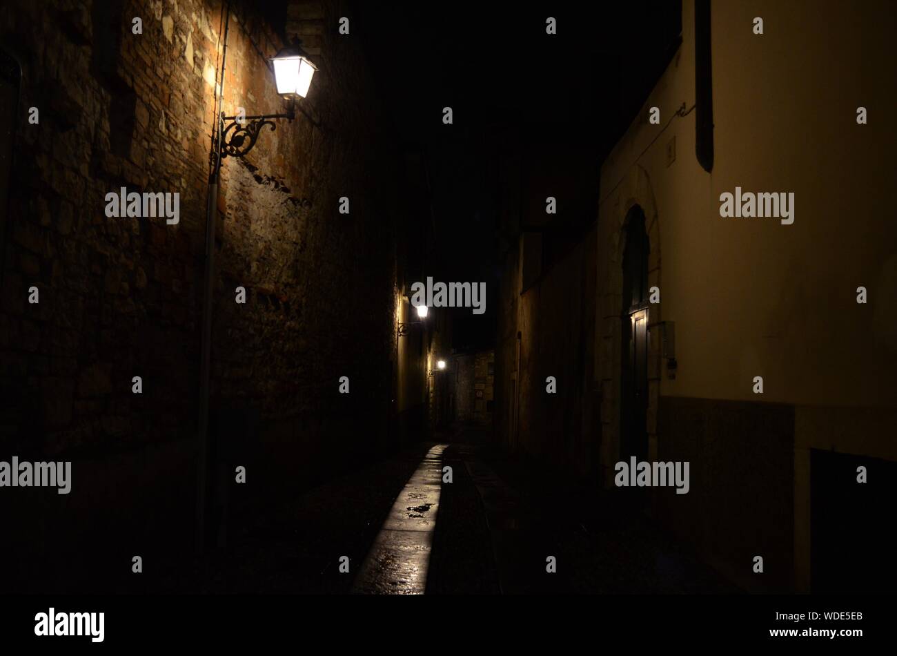 Empty alley at night hi-res stock photography and images - Alamy