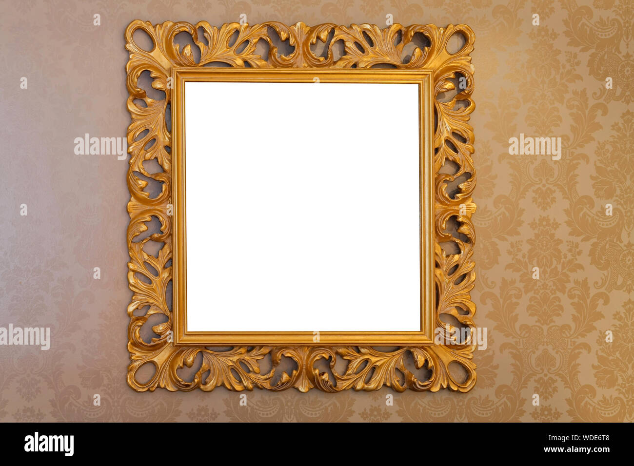 Golden and engraved old style picture frame Stock Photo - Alamy
