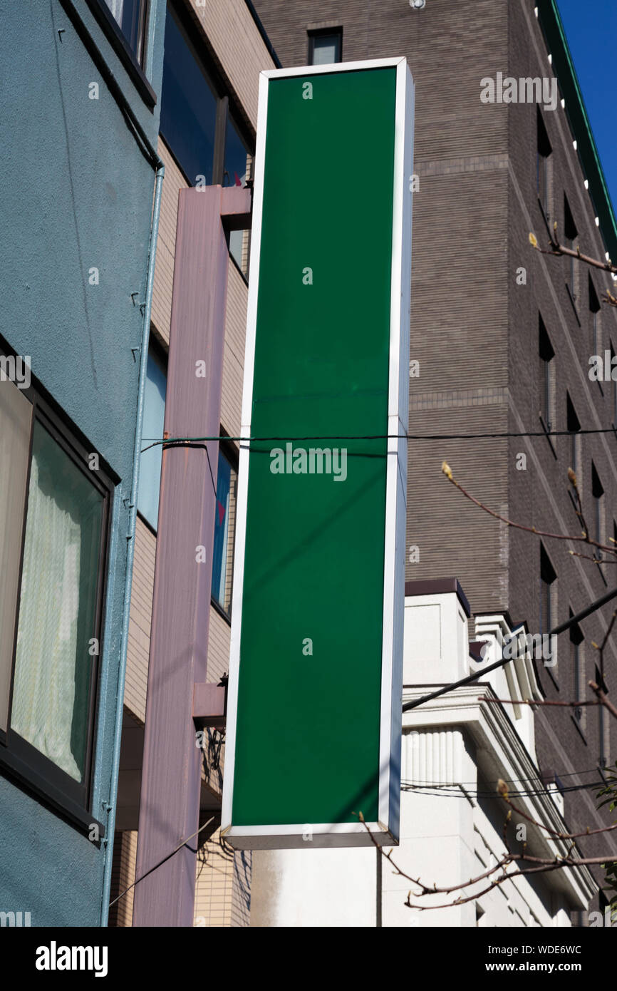 Green sign at the streets of Tokyo Stock Photo - Alamy