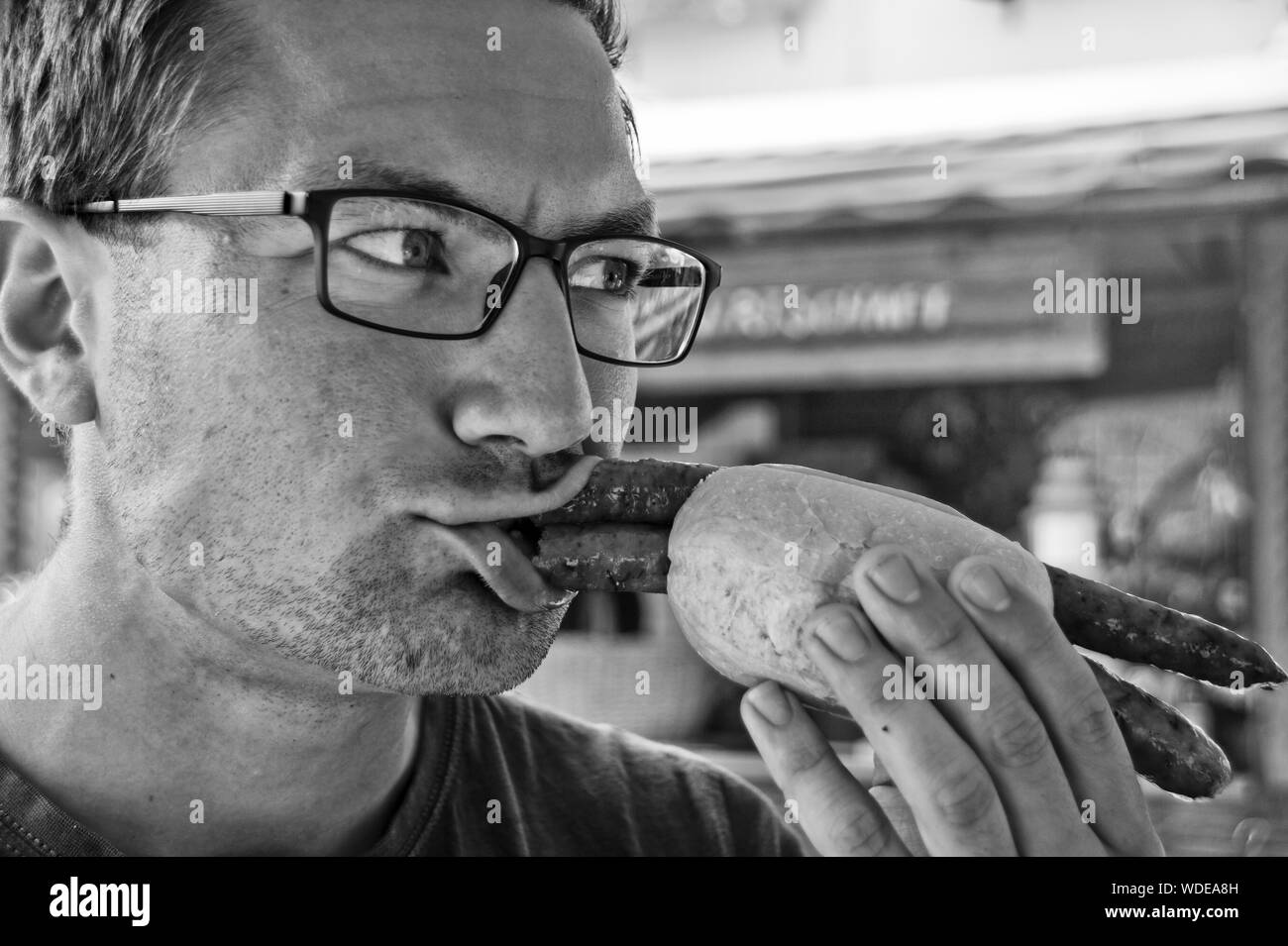 Unhealthy eating man Black and White Stock Photos & Images - Alamy