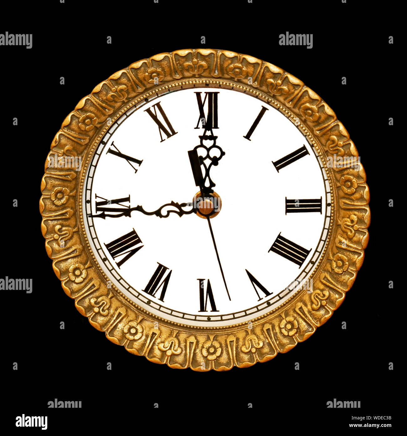 Very old analogue clock with roman numbers Stock Photo - Alamy