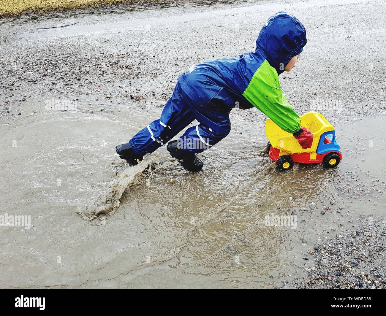 Car Puddle Person High Resolution Stock Photography and Images - Alamy