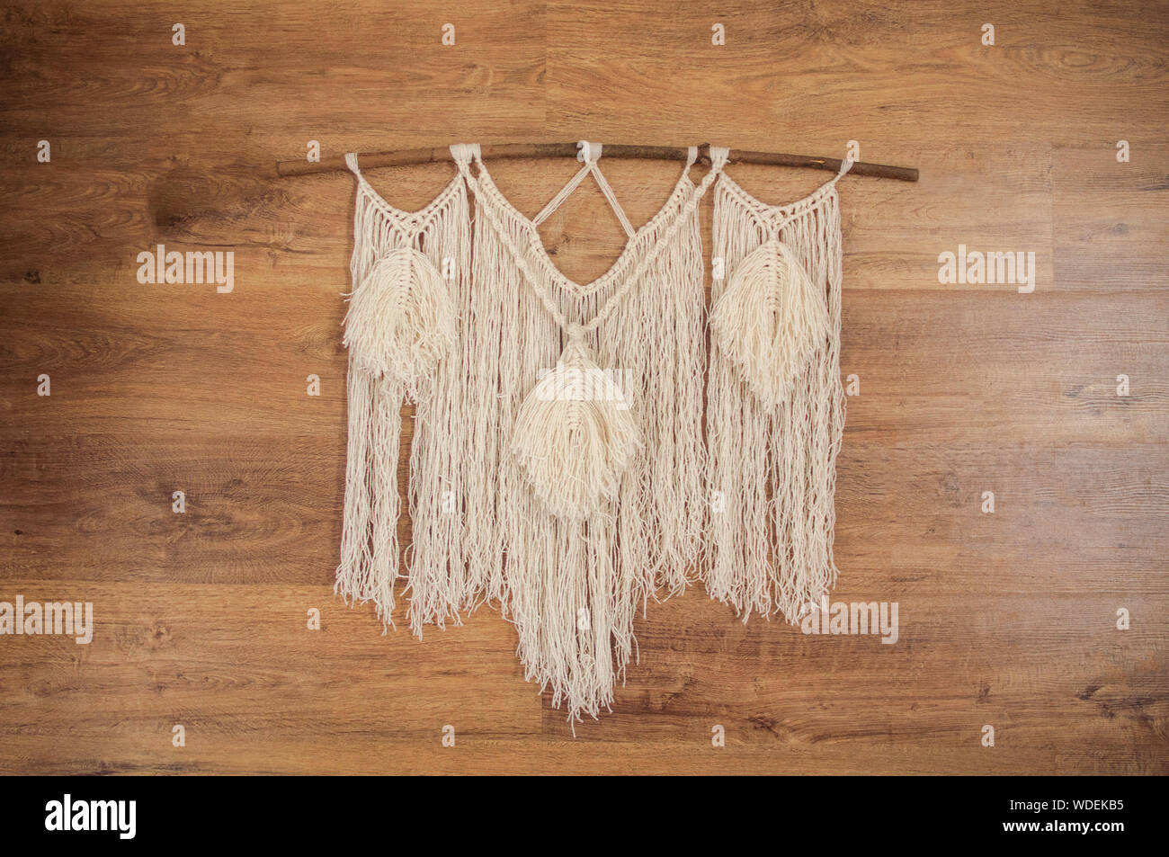 handmade macrame mural hanging on the wall Stock Photo - Alamy