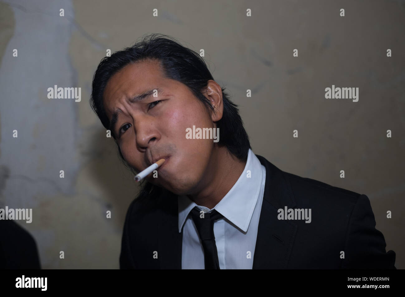 Indian boy smoking hi-res stock photography and images - Alamy