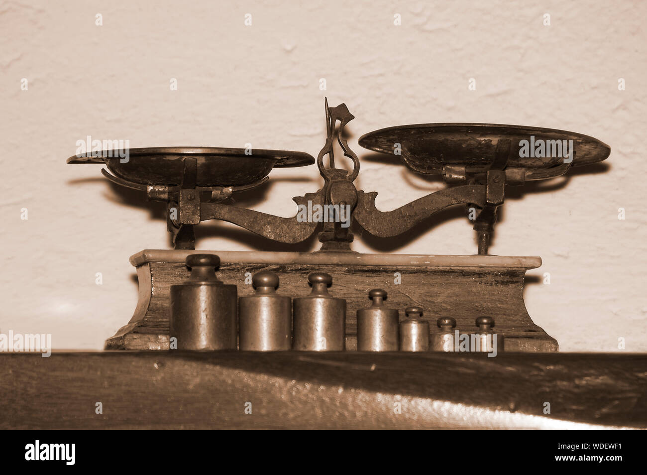 Weights weighing antique hi-res stock photography and images - Alamy