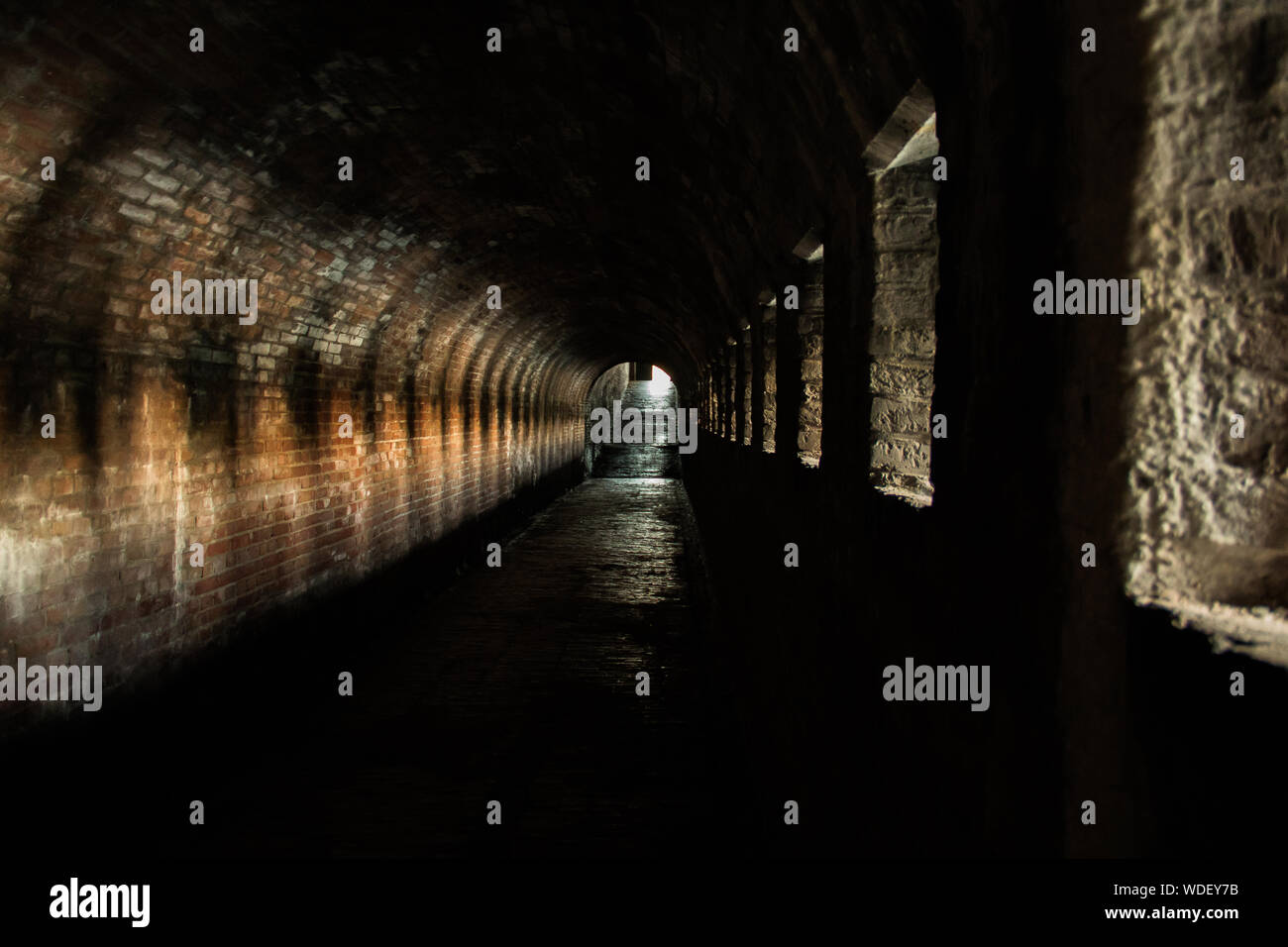 Narrow and dark tunnel hi-res stock photography and images - Alamy