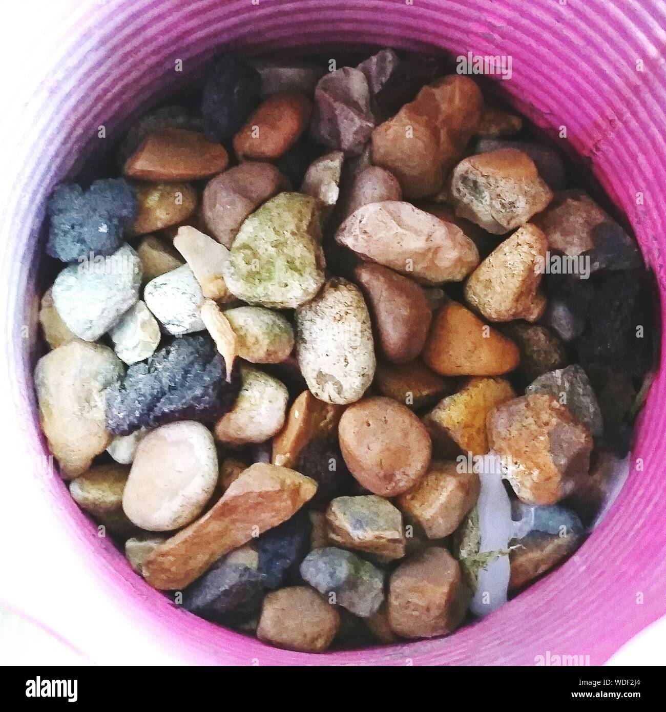 Bucket of stones hi-res stock photography and images - Alamy