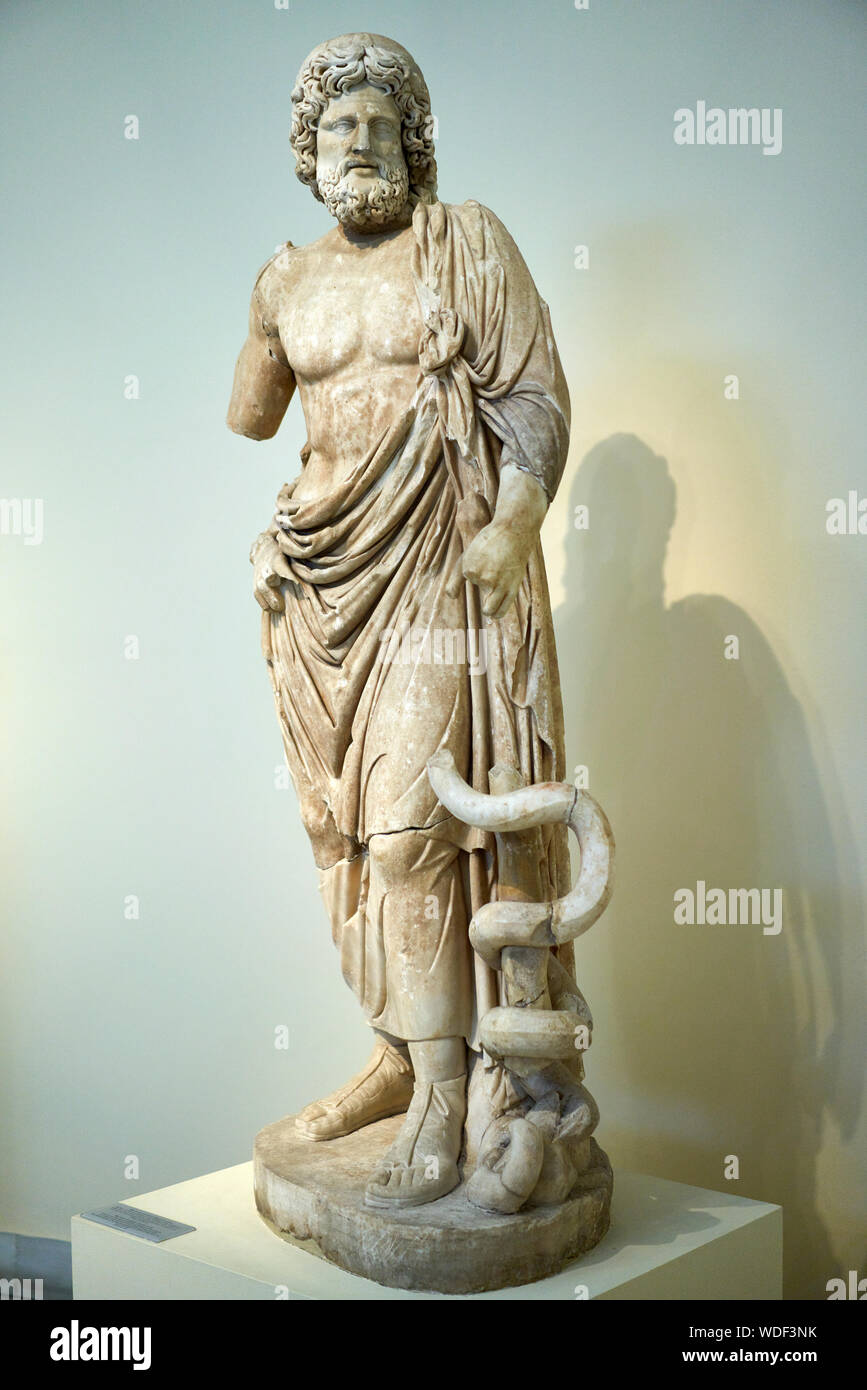 Statue of Asclepius God of medicine Stock Photo - Alamy