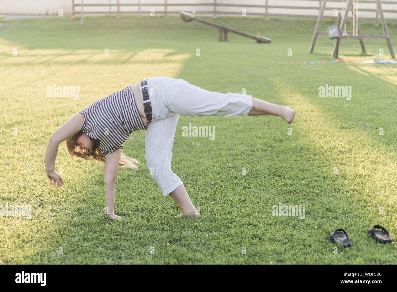 Woman Cartwheel High Resolution Stock Photography and Images - Alamy