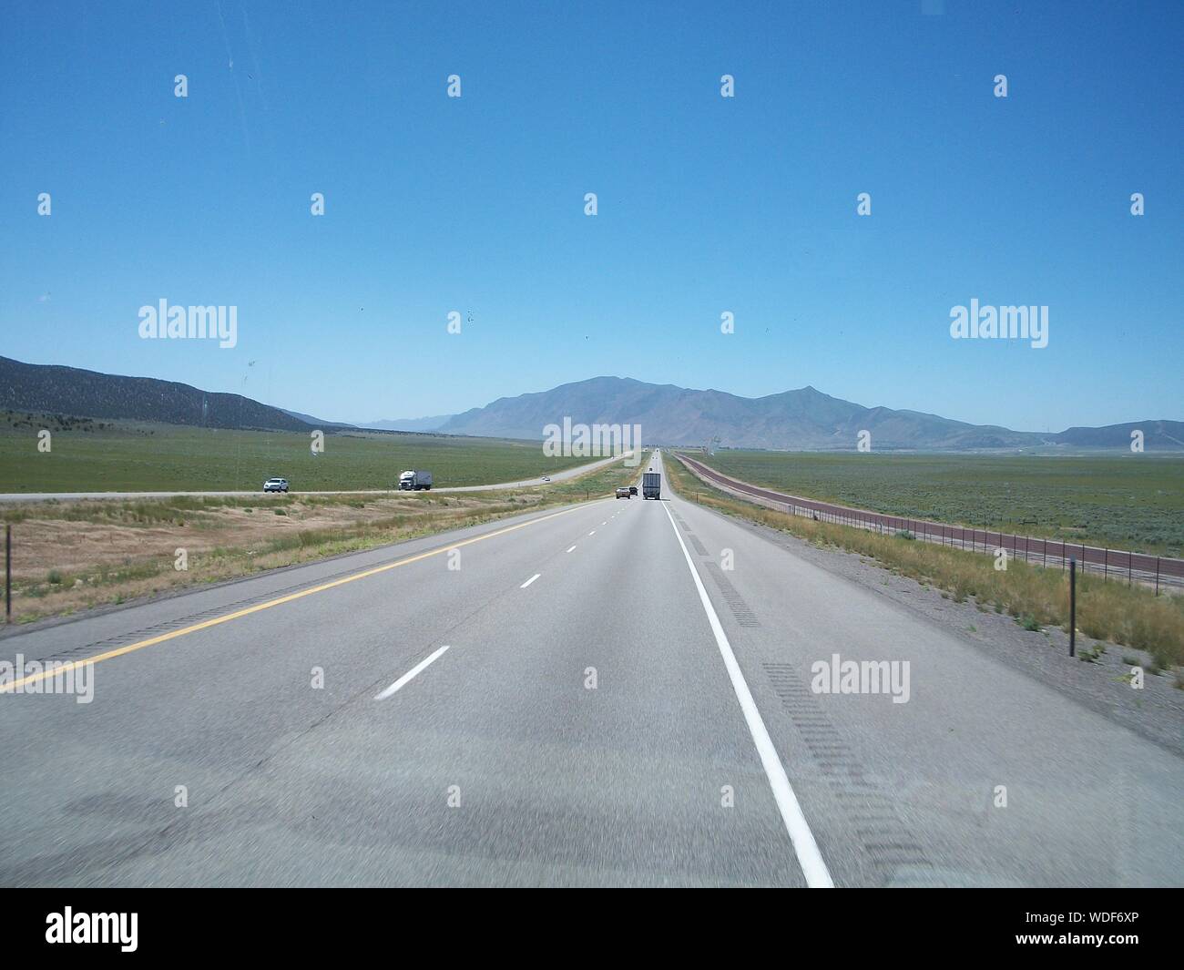 Southbound Interstate 15 in Utah, USA. Distant mountains at the ...