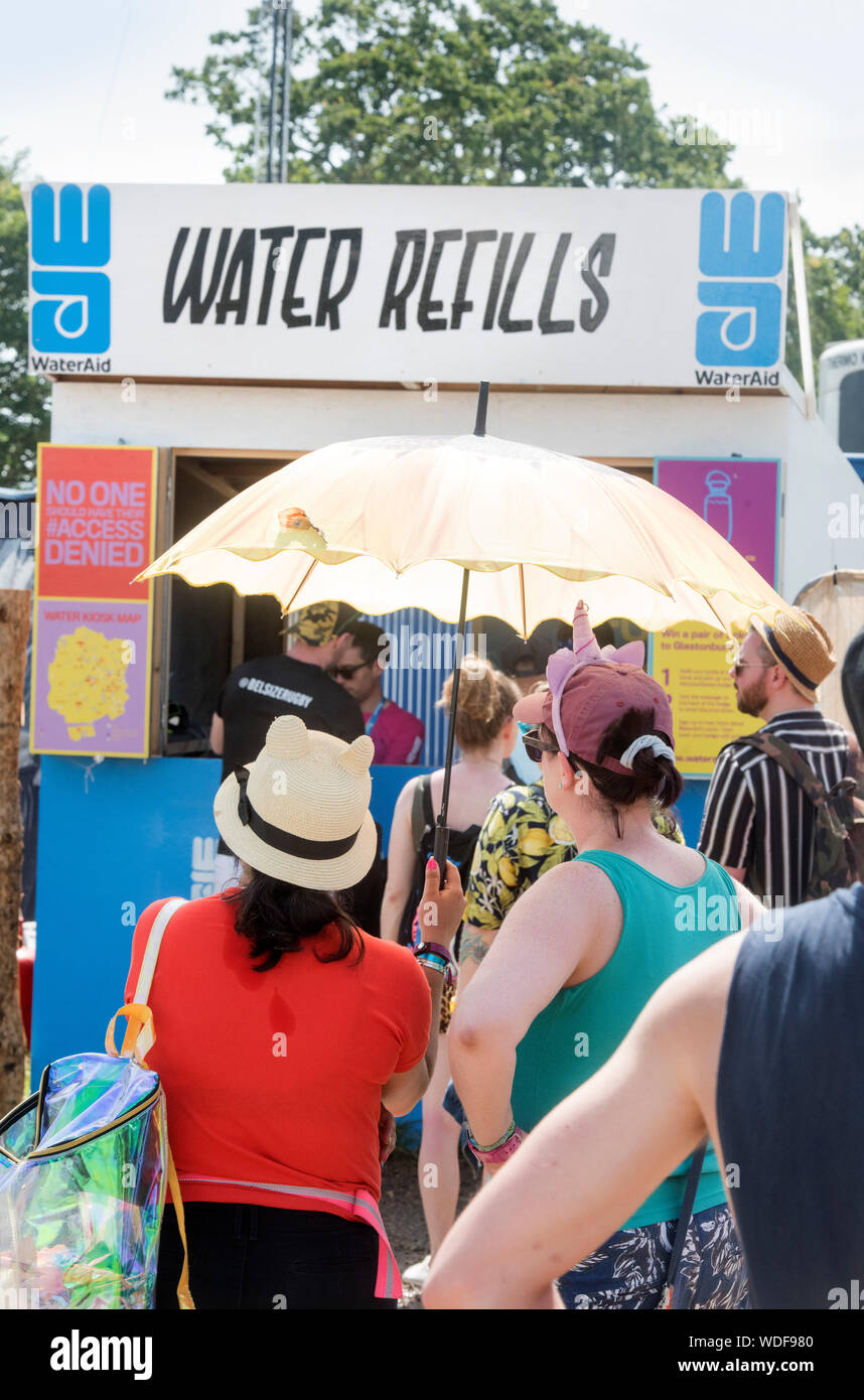 Queues for refills of water hi-res stock photography and images - Alamy