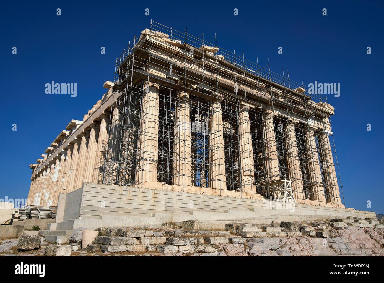 The Parthenon temple, under scaffolding, on the Acropolis in Athens ...
