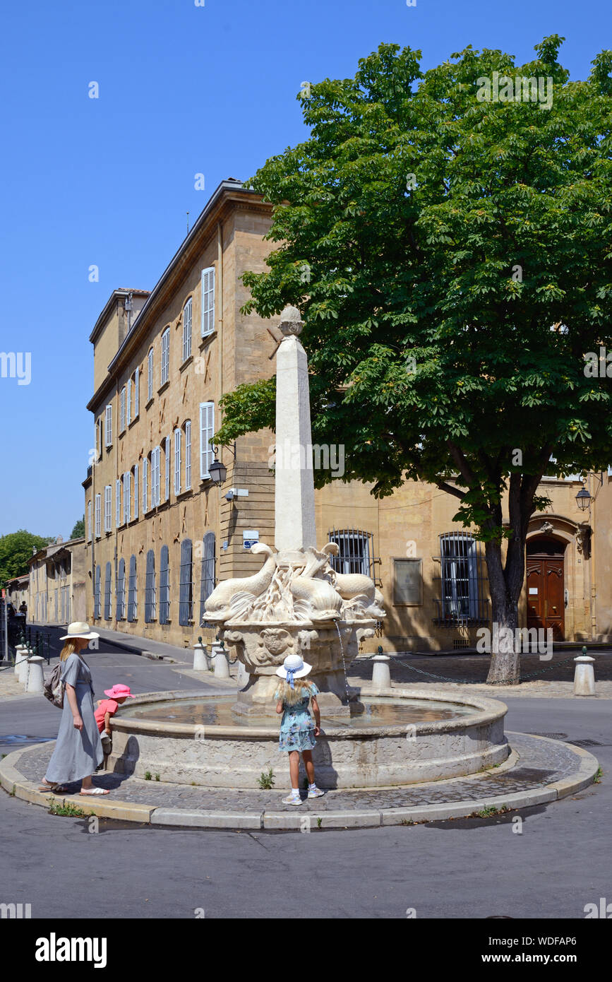 Tourists, Mother & Children in Straw Hats, and Fontaine des Quatre ...