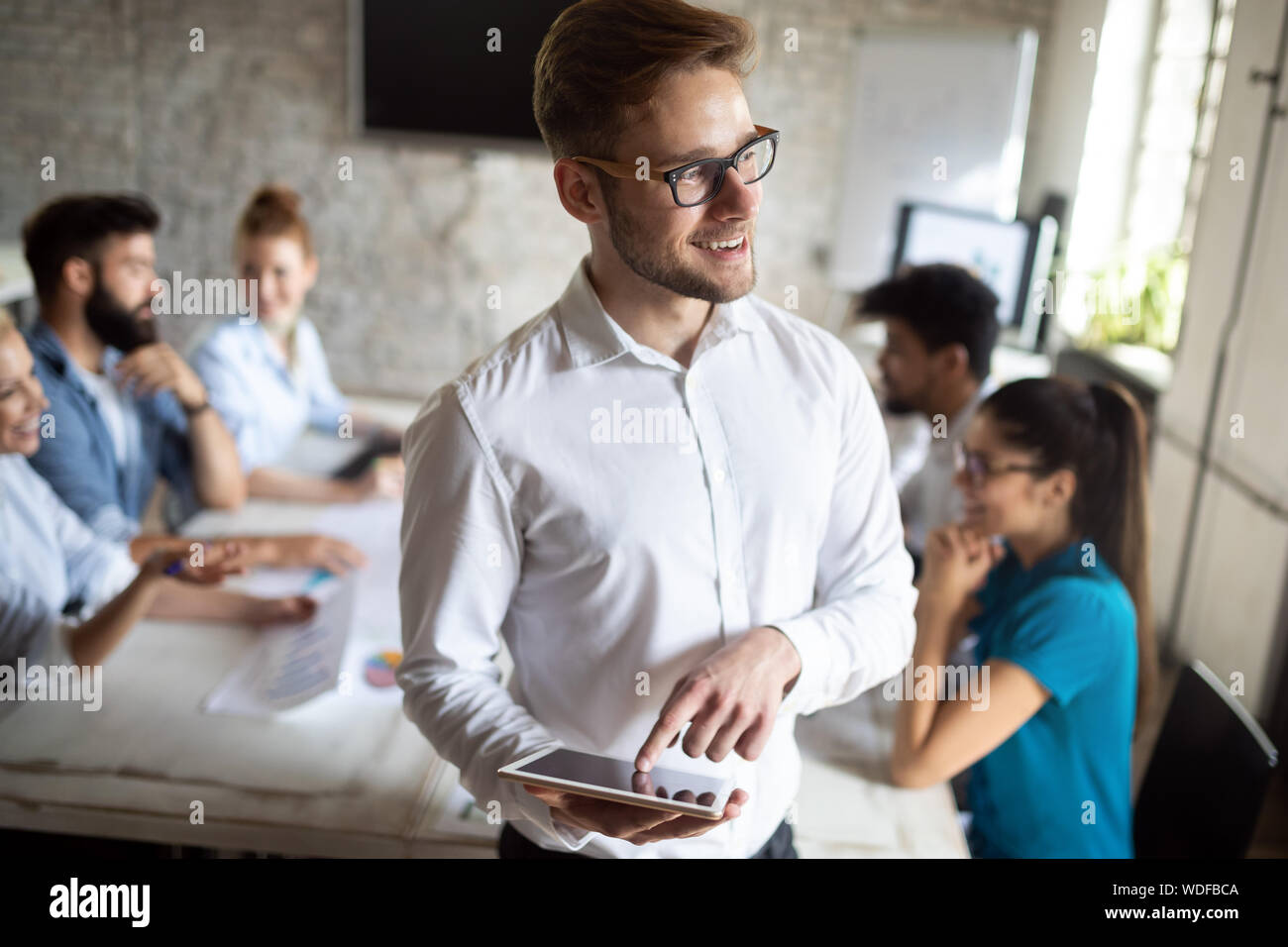 Happy creative team in office. Business, startup, design, people and ...