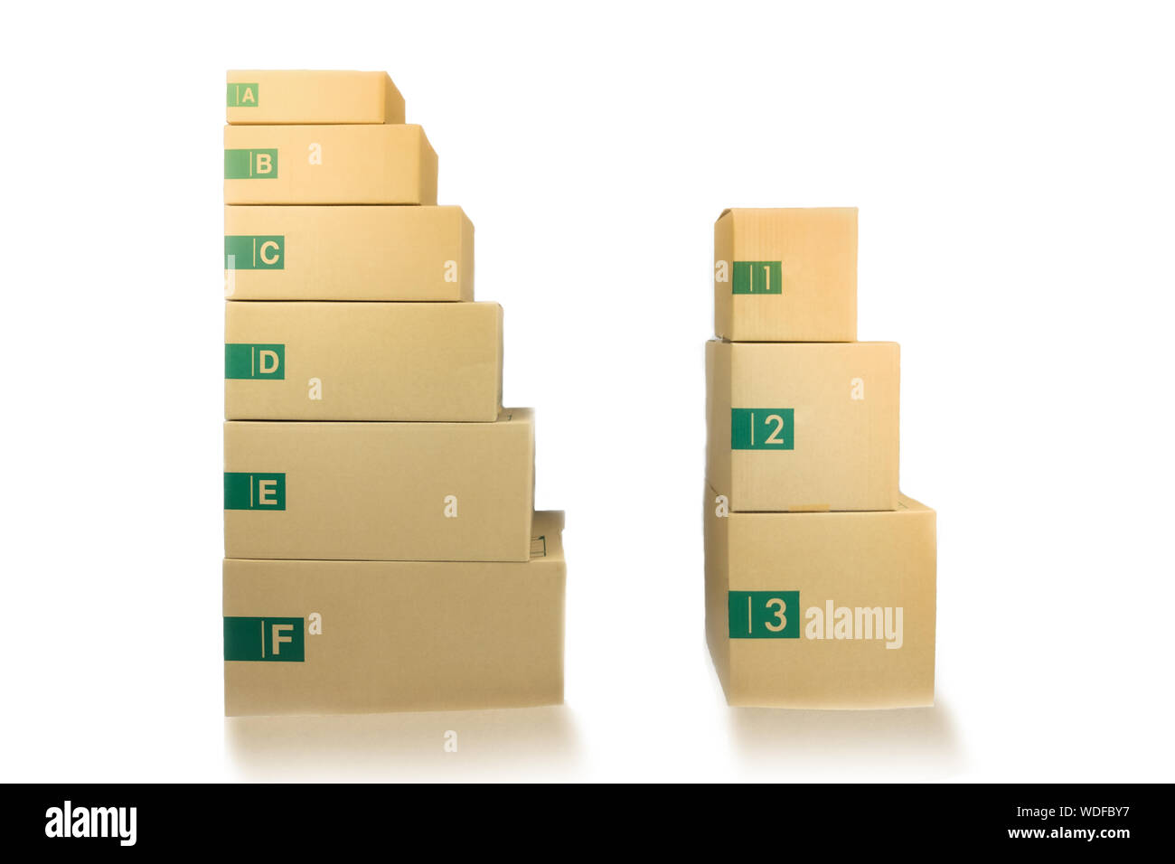 Cardboard parcel boxes stacked on each other at white background Stock ...