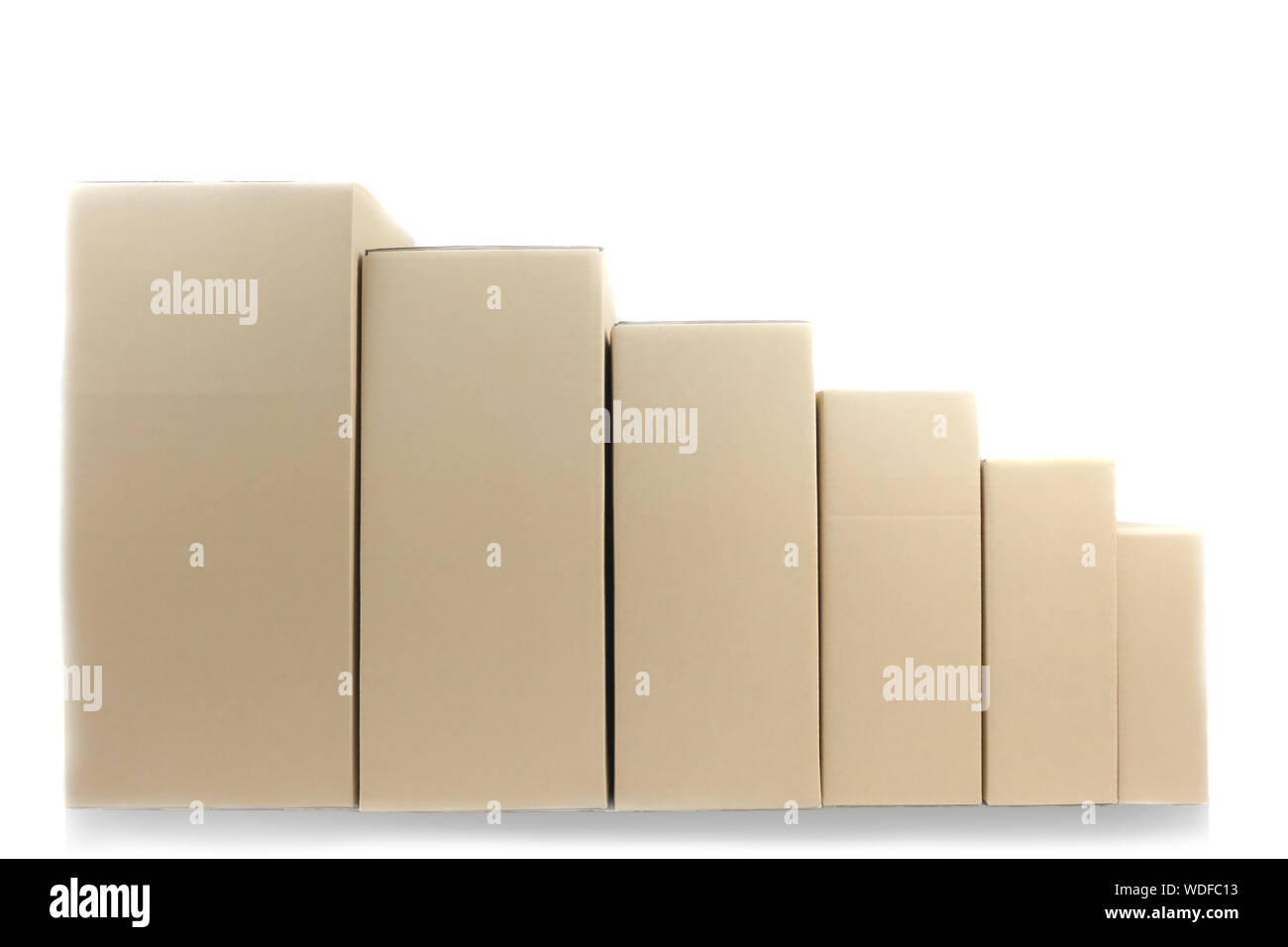 Cardboard parcel boxes stacked on each other at white background Stock ...