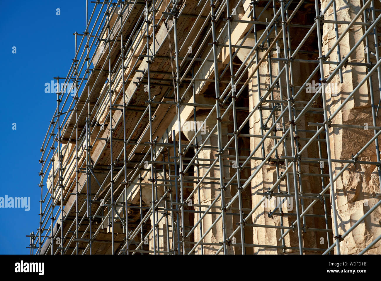The Parthenon temple, under scaffolding, on the Acropolis in Athens ...