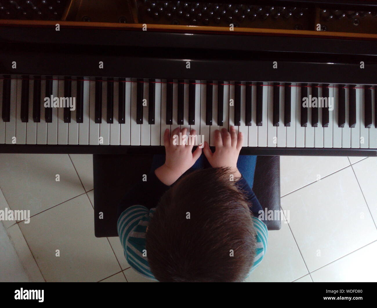 Boy Playing Piano High Resolution Stock Photography and Images - Alamy