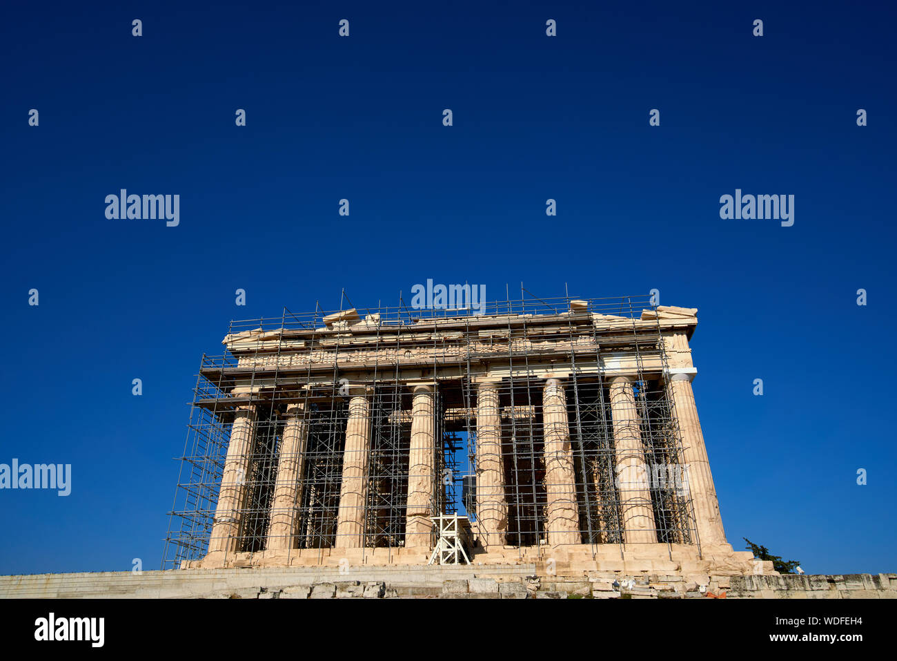 The Parthenon temple, under scaffolding, on the Acropolis in Athens ...