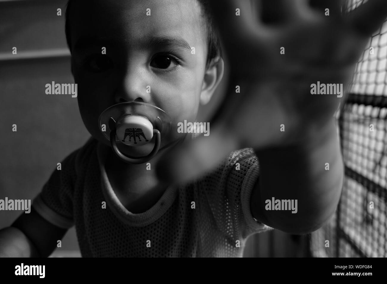 Pacifier baby Black and White Stock Photos & Images - Alamy