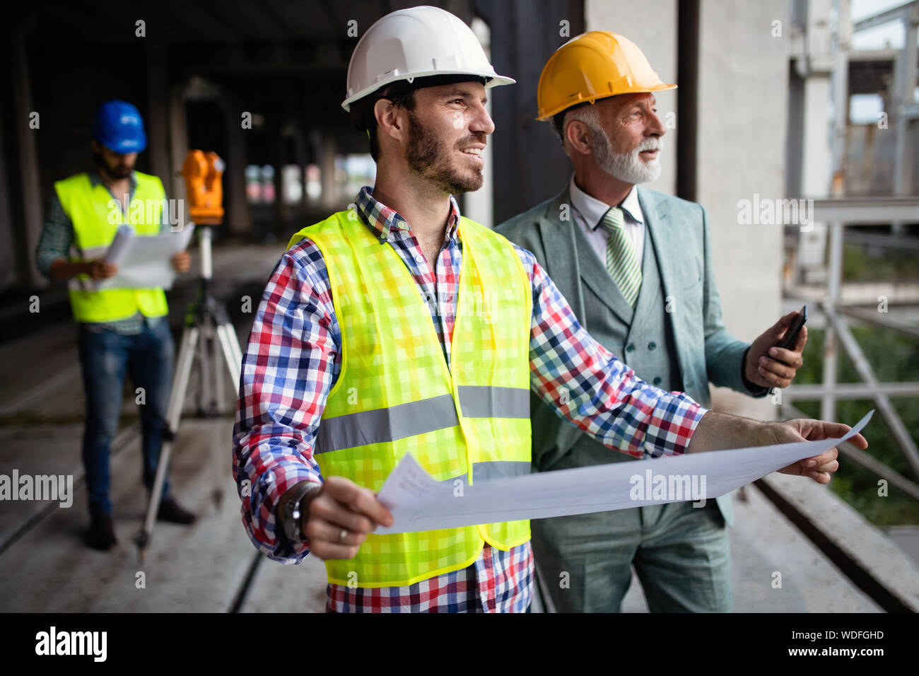 Group of construction engineer working in construction site Stock Photo ...
