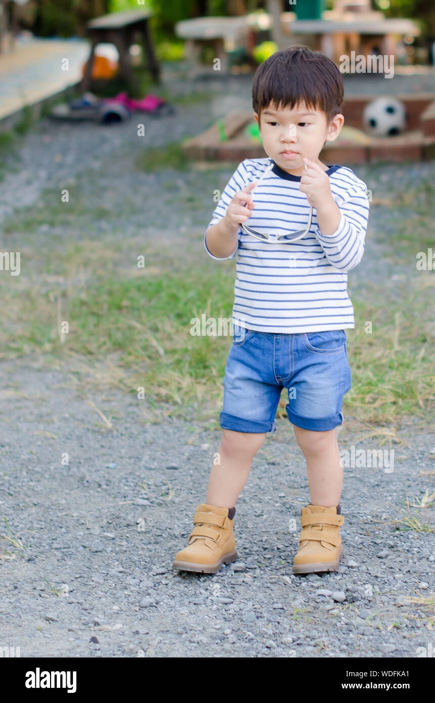 Indian baby standing hi-res stock photography and images - Alamy