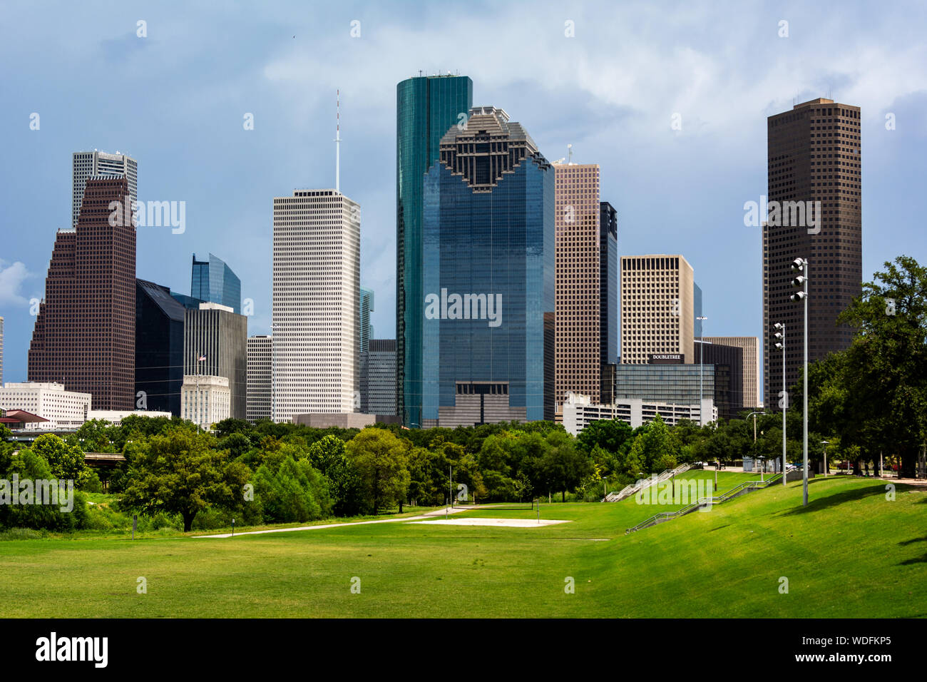 Houston Texas Downtown buildings from a green city park. Skyscrapers ...