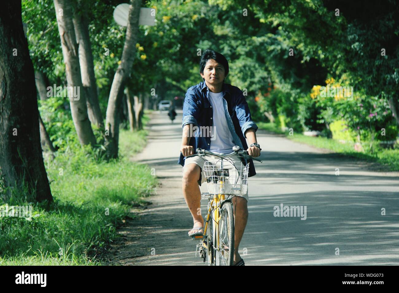 Indian man on bicycle hi-res stock photography and images - Alamy