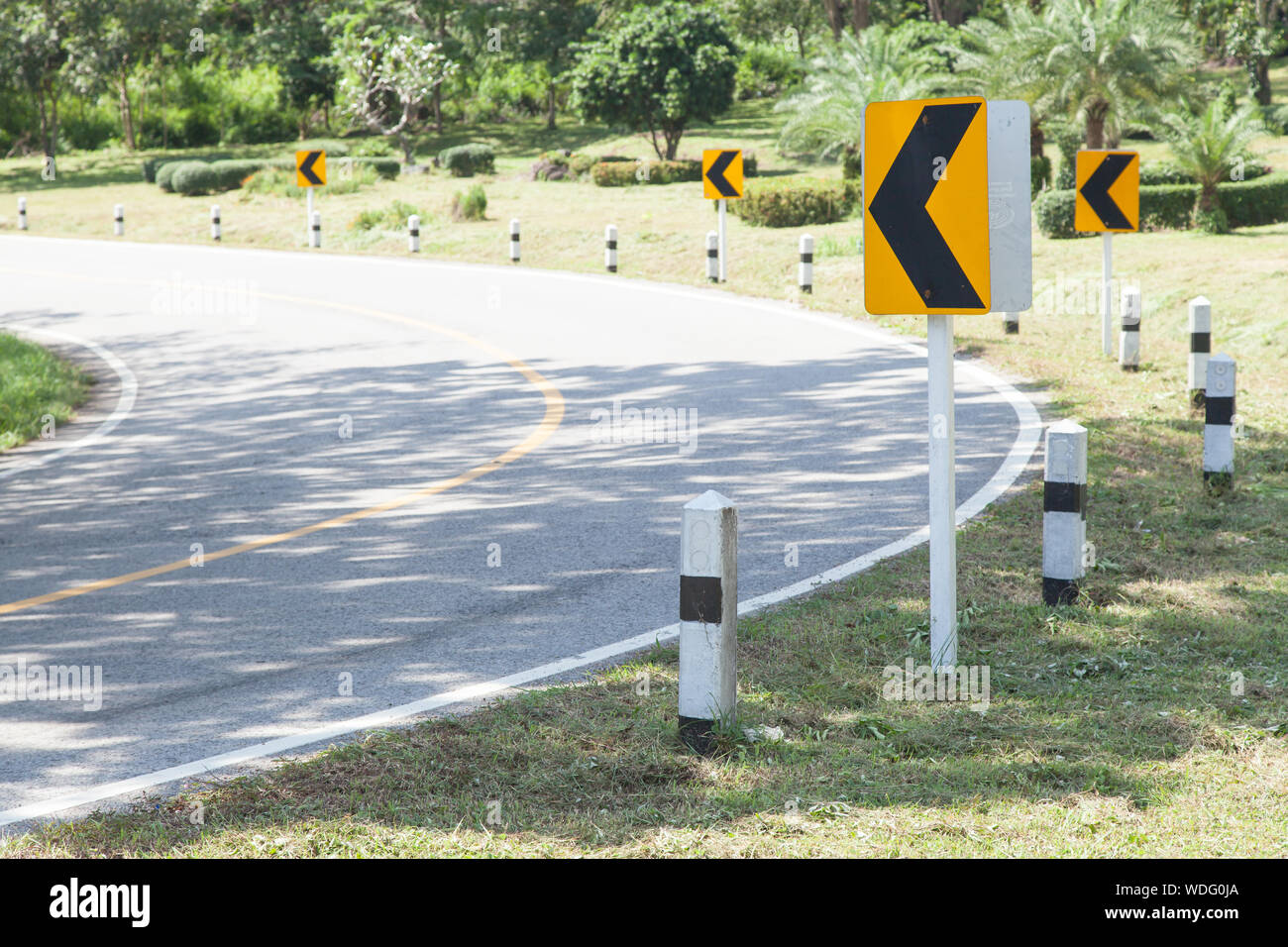 Curved arrow road marking hi-res stock photography and images - Alamy