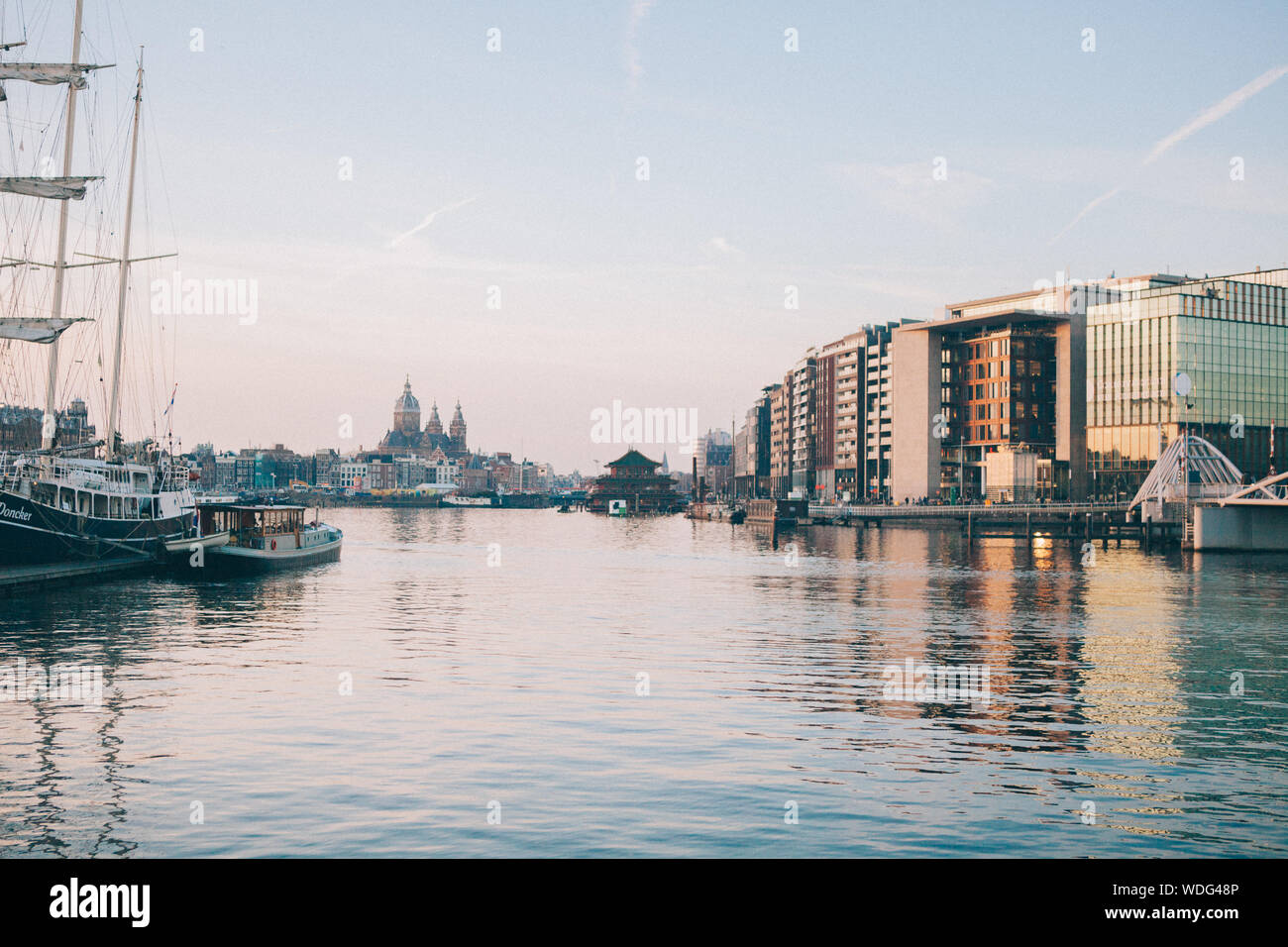 View Of City At Waterfront Stock Photo - Alamy