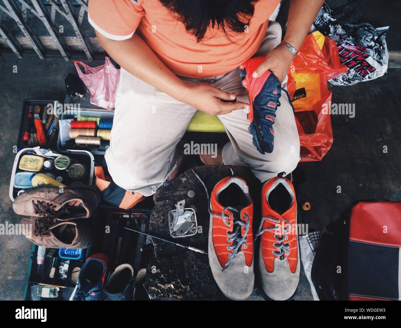 Man stitching hi-res stock photography and images - Alamy