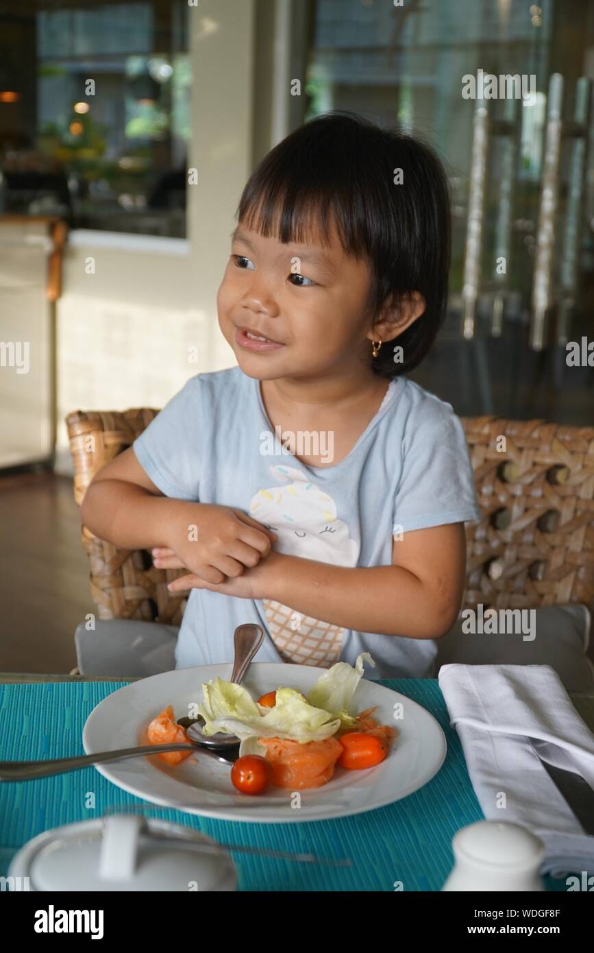 Smiling sitting eating food and drink hi-res stock photography and ...