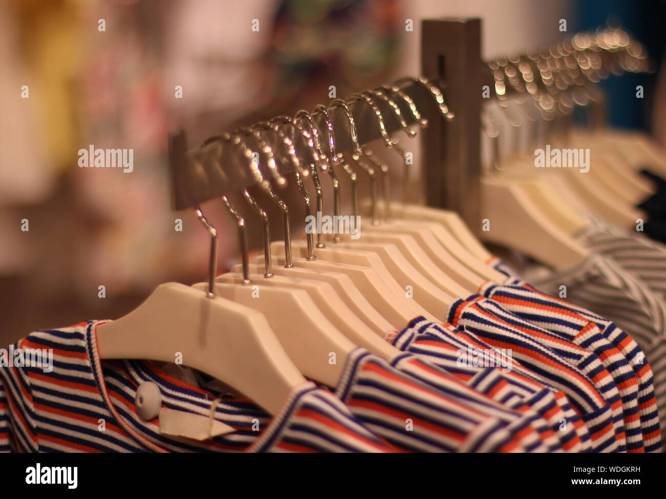 Clothes on hangers Stock Photo - Alamy