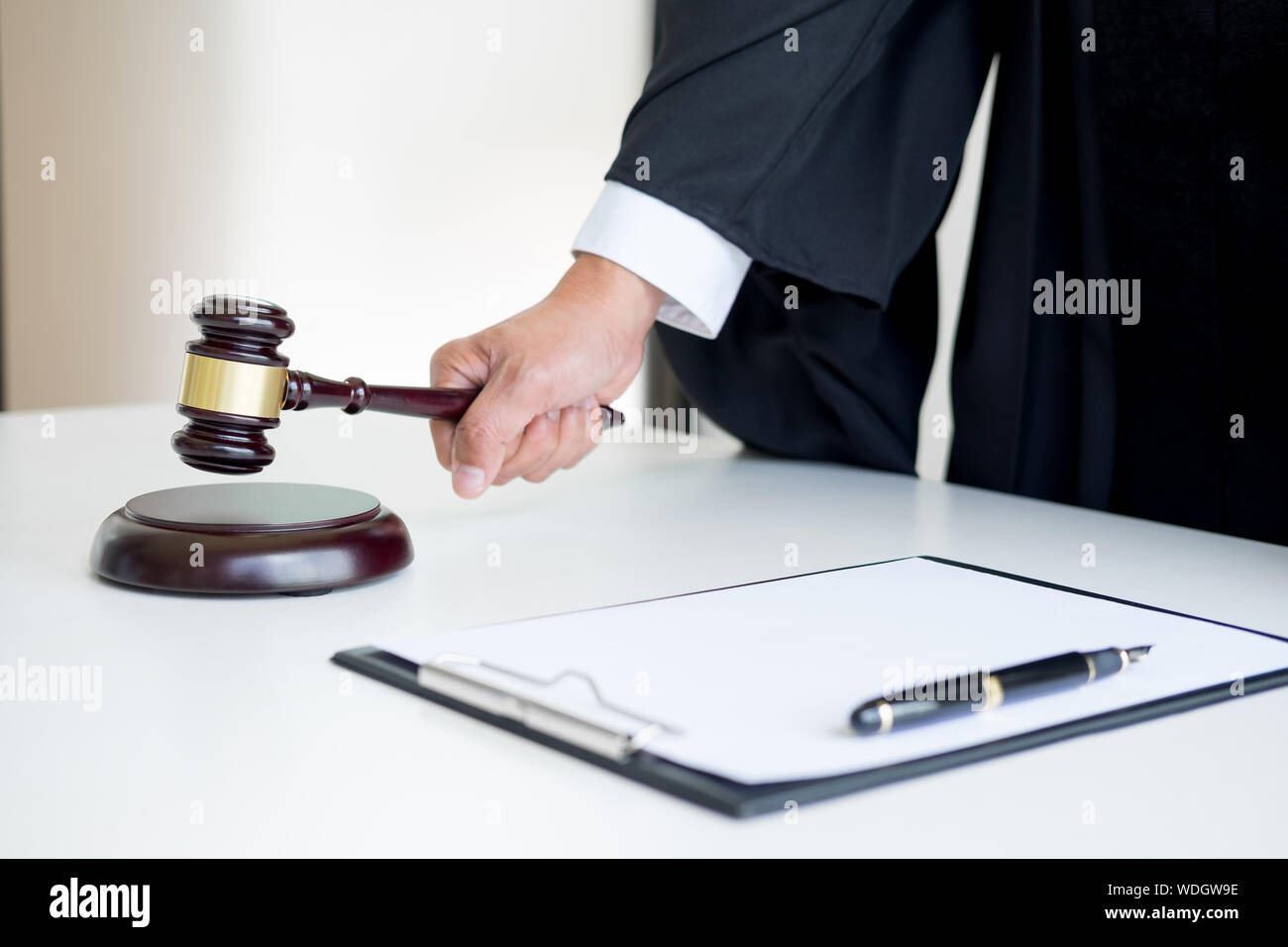 Man with gavel hi-res stock photography and images - Alamy