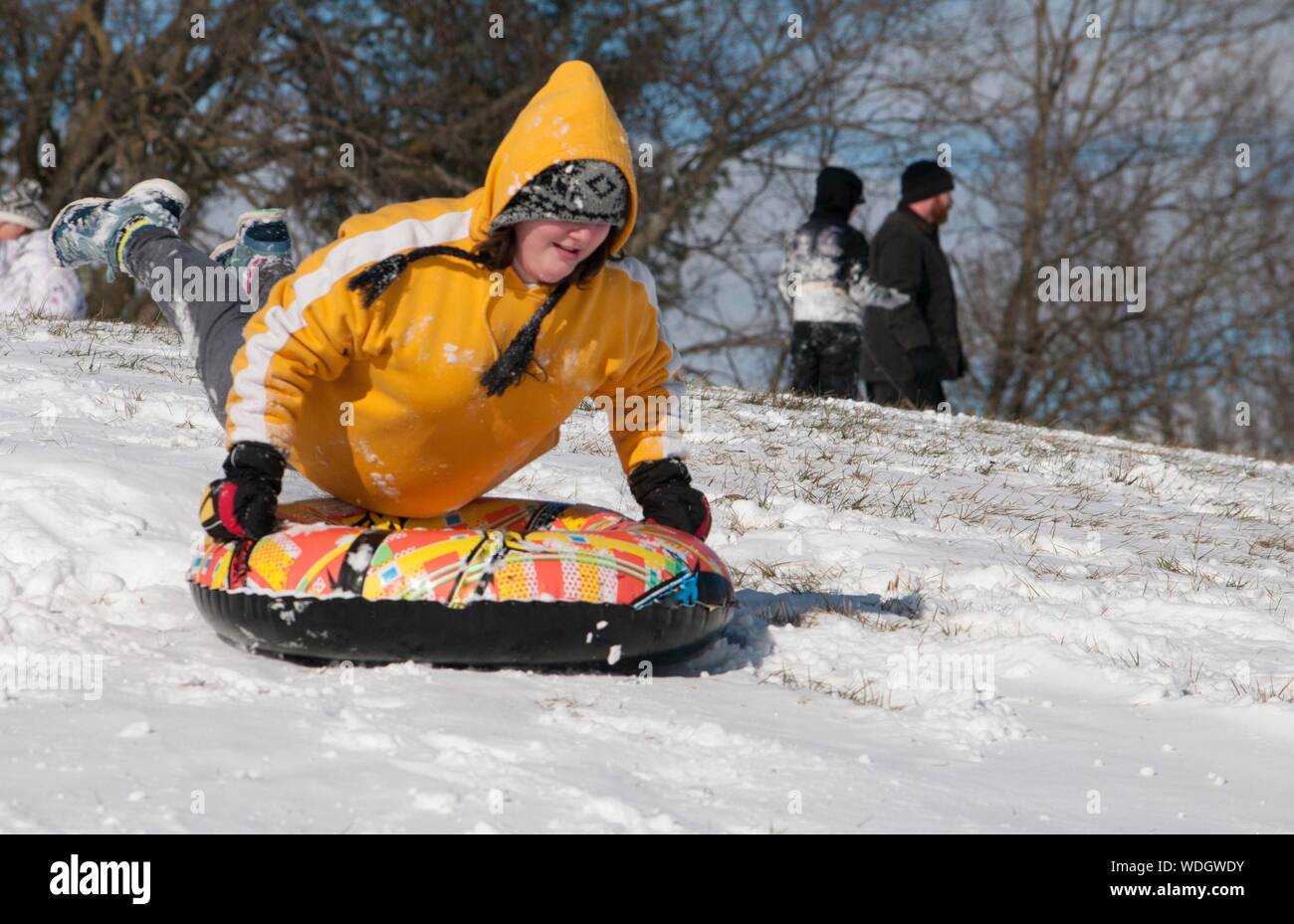 Sliding on snow hi-res stock photography and images - Alamy