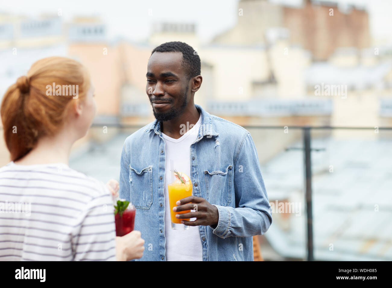 African girl drinking juice hi-res stock photography and images - Alamy