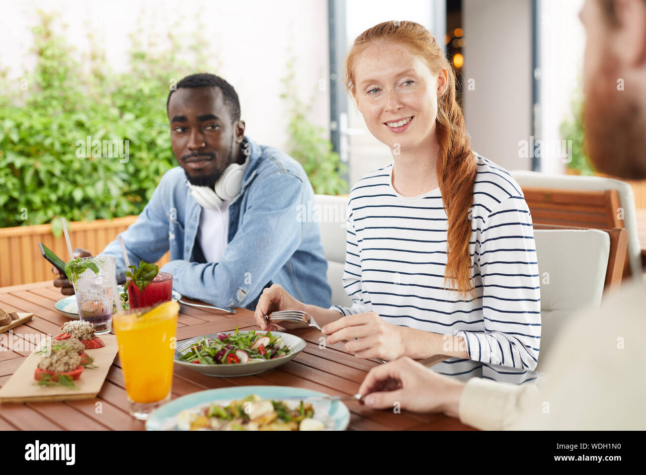 Females talking during meal hi-res stock photography and images - Alamy