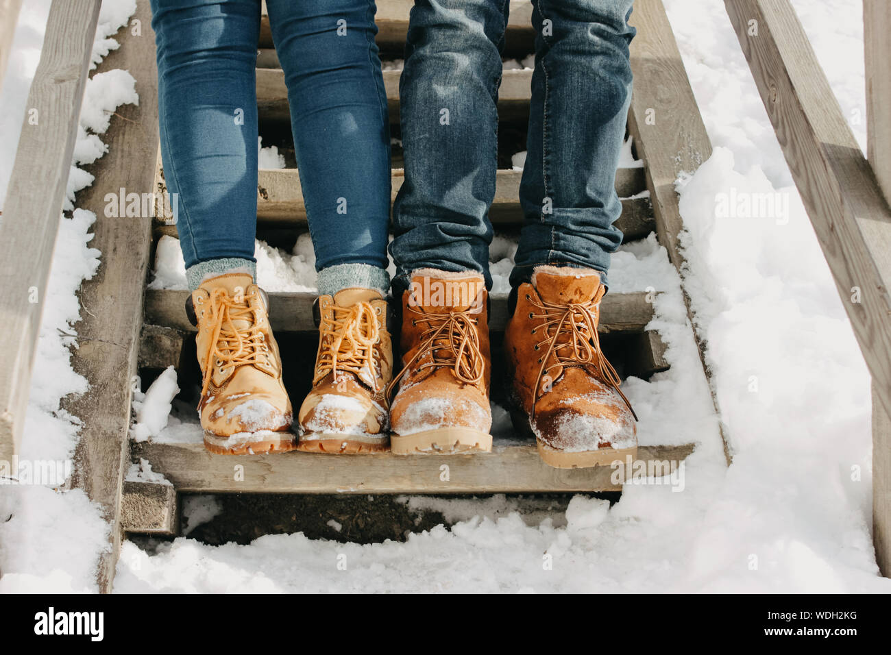 The crop photo of young couple at the nature park in the cold season ...