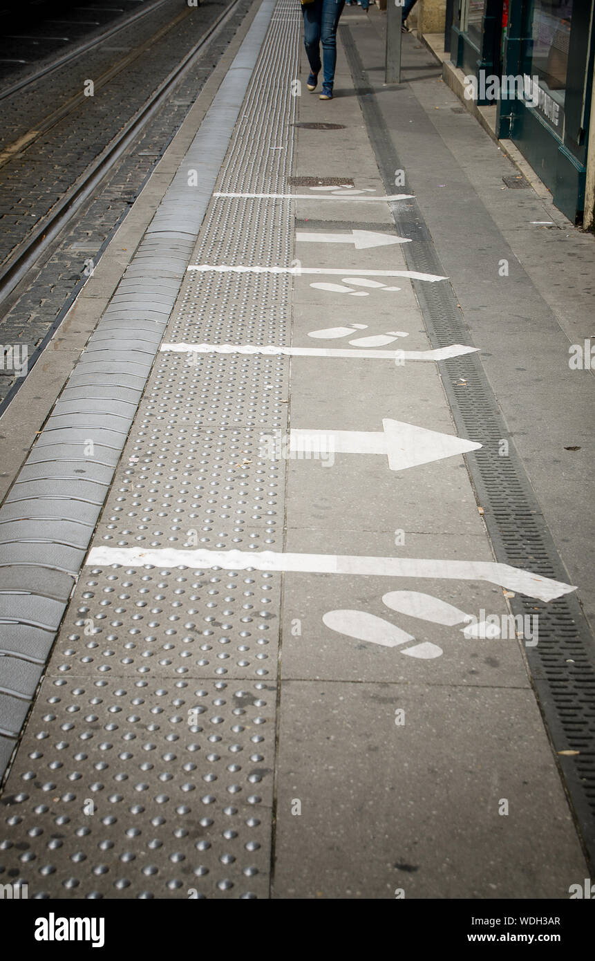 Indicative signs painted on the ground Stock Photo - Alamy