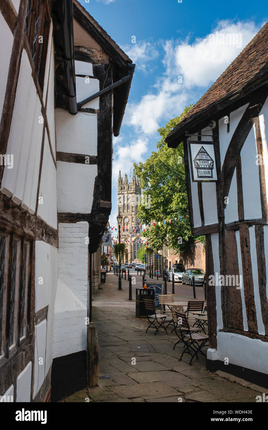Tudor timber framed black and white medieval buildings and St Marys ...