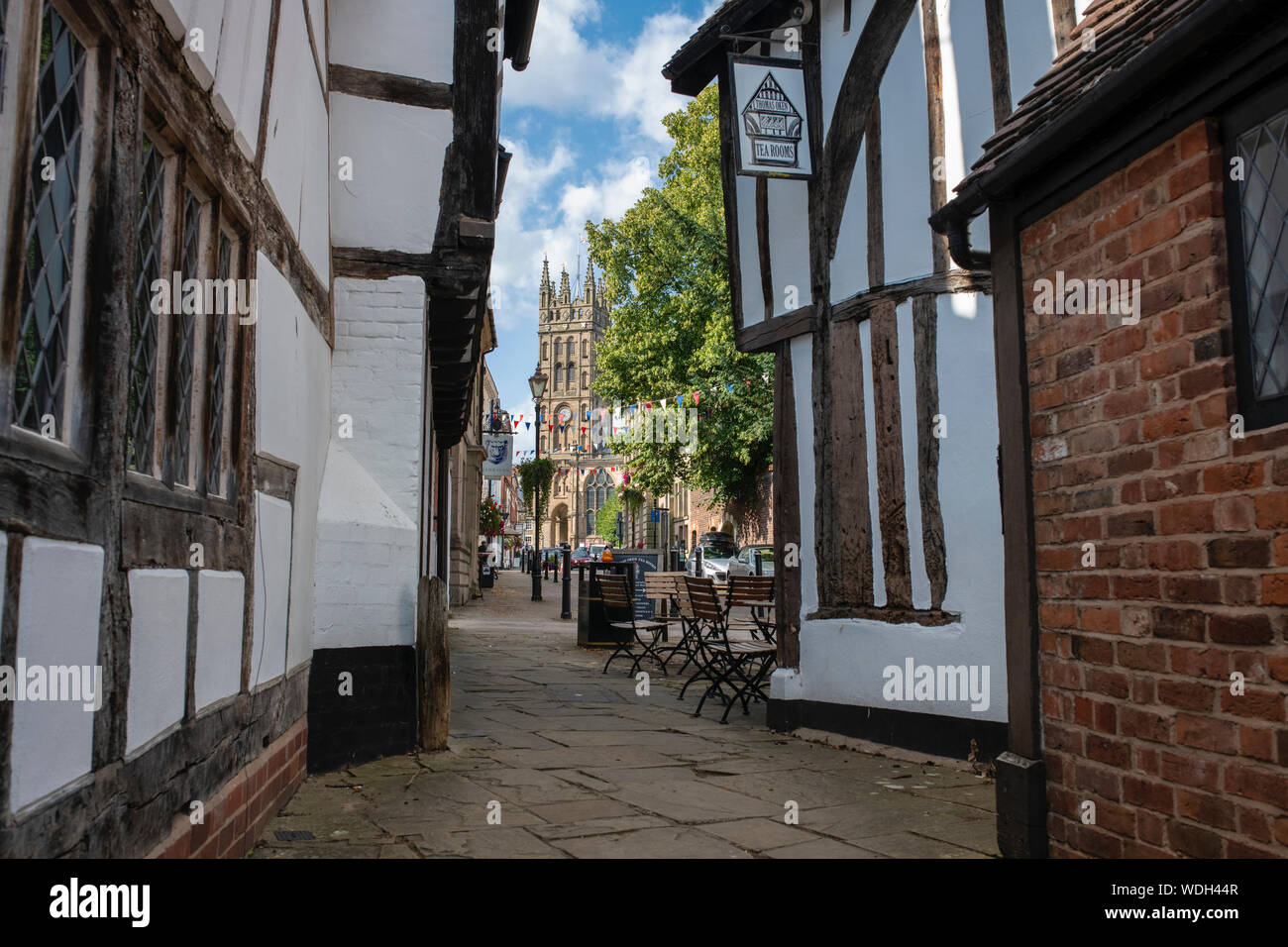 Tudor timber framed black and white medieval buildings and St Marys ...