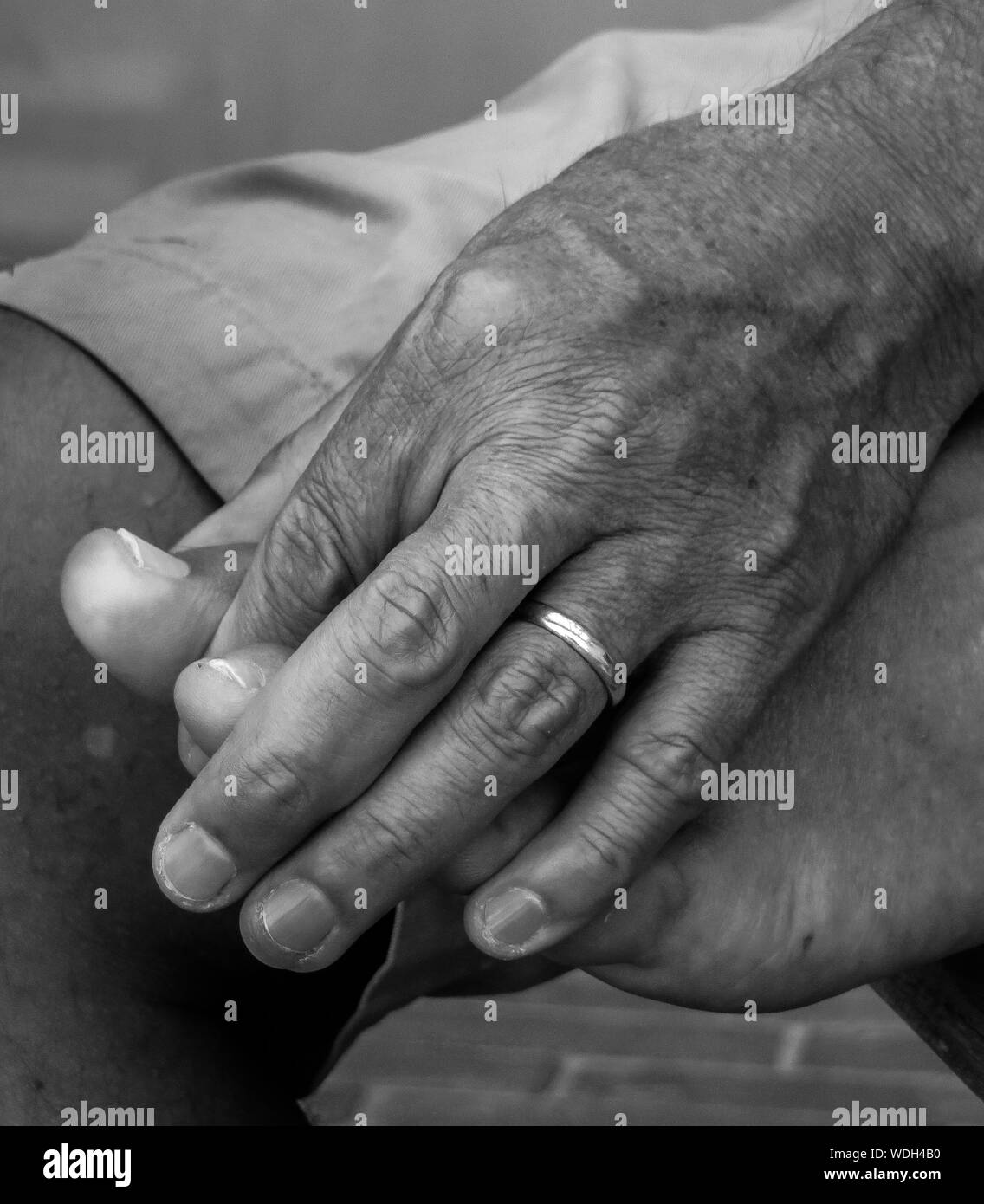 Hand to foot hi-res stock photography and images - Alamy