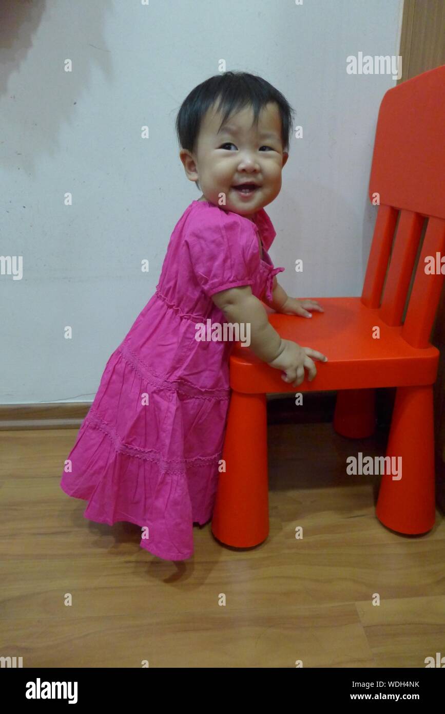 Indian baby standing hi-res stock photography and images - Alamy