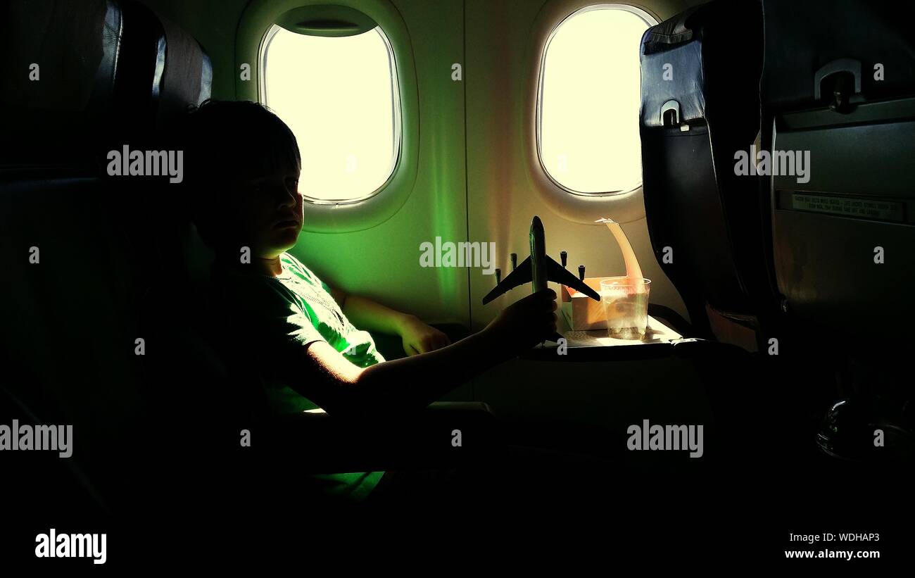 Boy with model airplane hi-res stock photography and images - Alamy