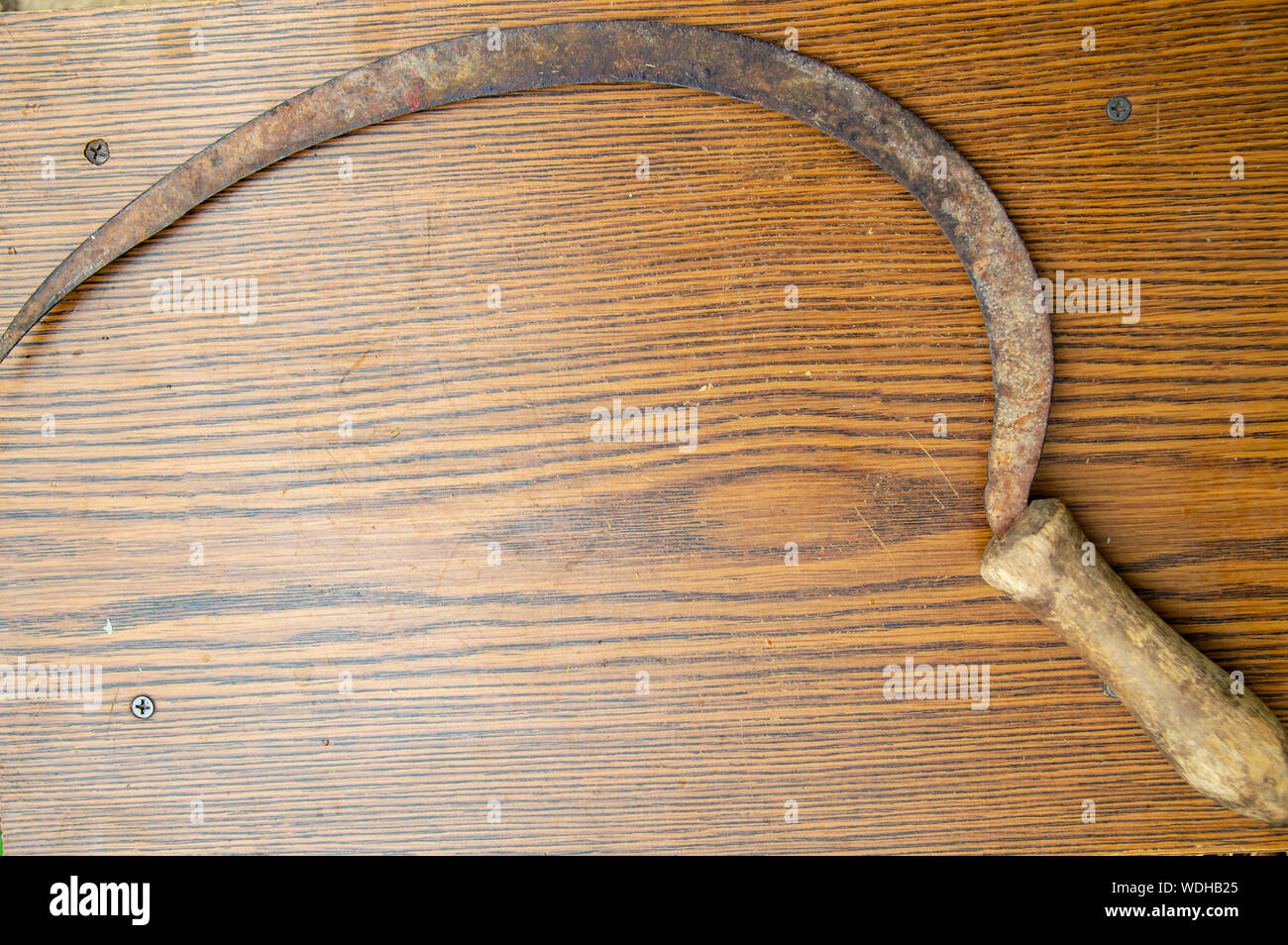 Old sickle for the harvest of grain. Tool Stock Photo - Alamy