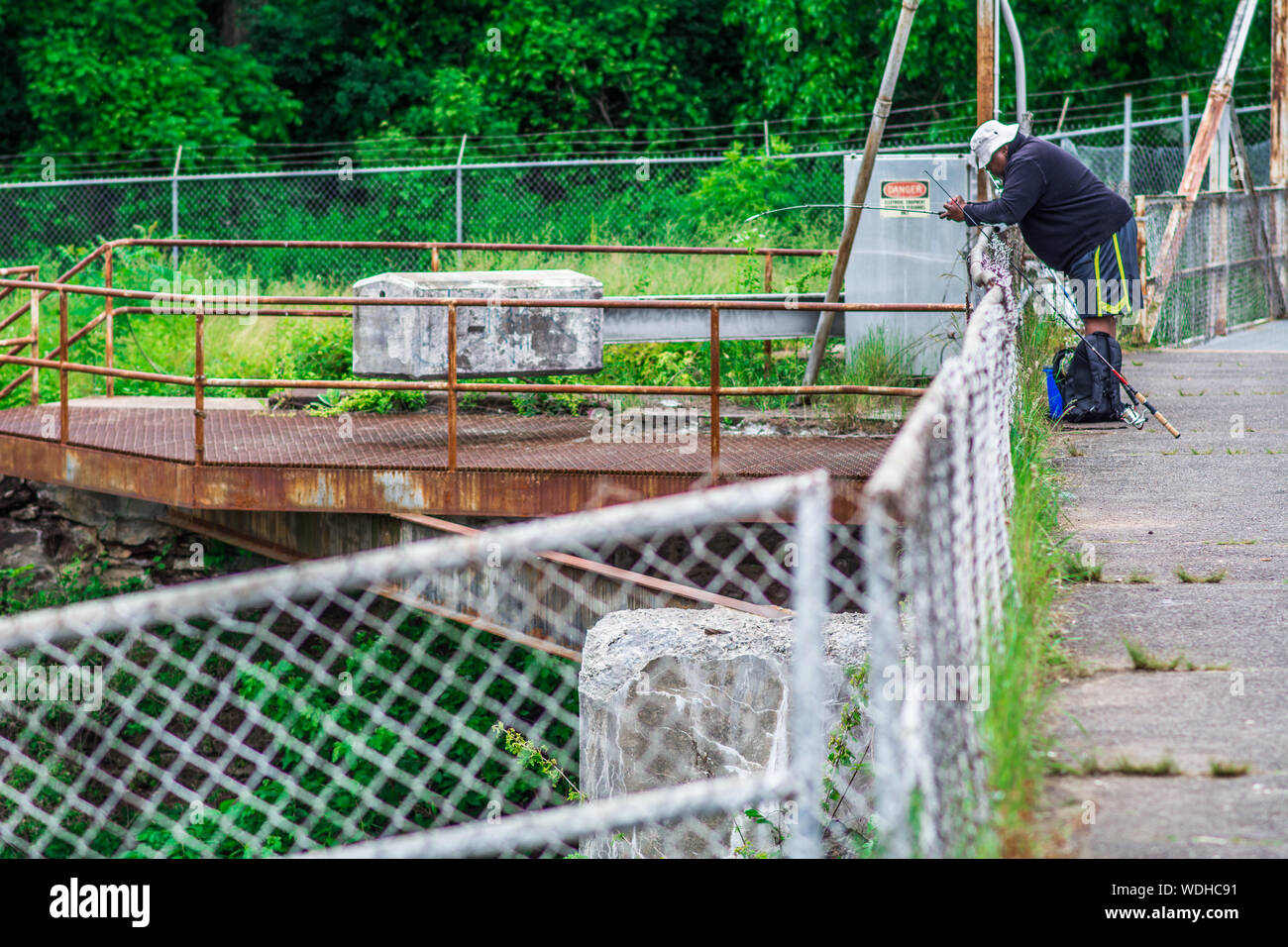 Leaning on bridge railing hi-res stock photography and images - Alamy